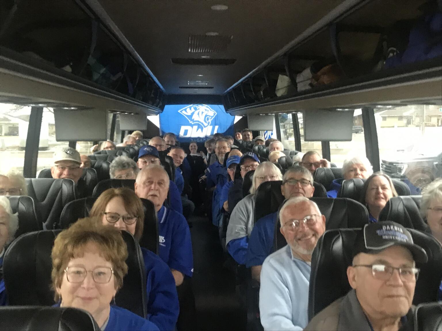 DWU Tiger fan bus arrives in Sioux City as Tiger fans chant “Go Tigers ...